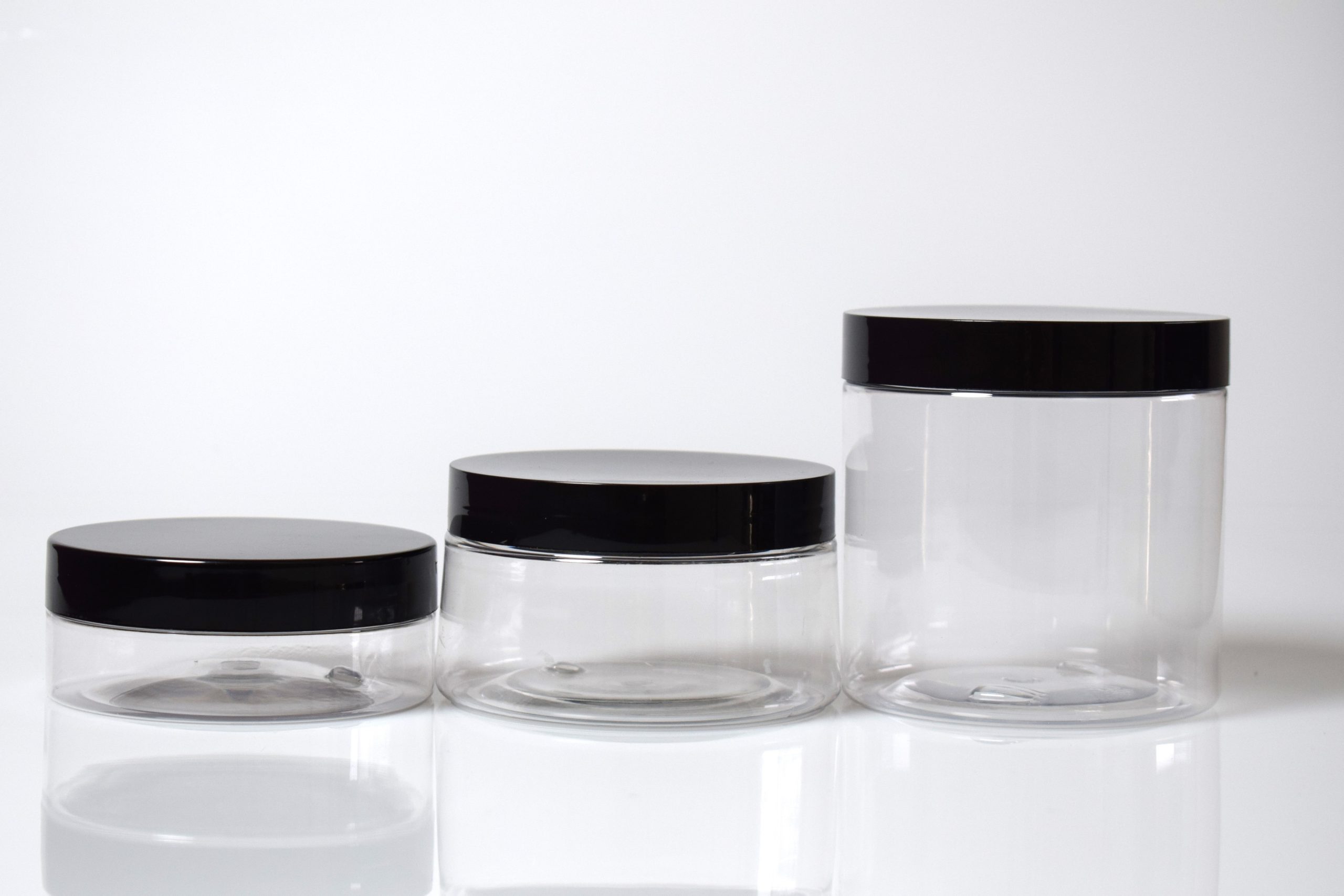 علب شفاف مع غطاء اسود transparent PET cylinder jar - A2Z